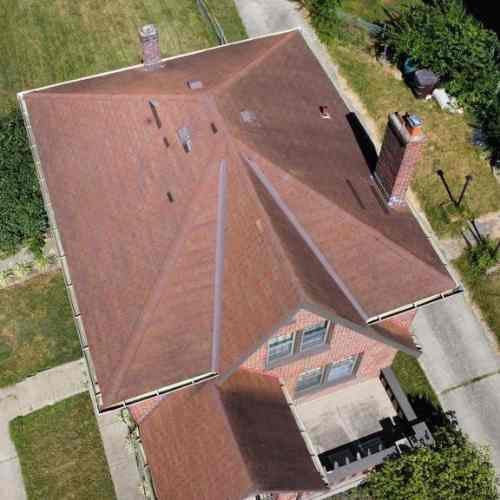 Residential Roofing - Lady On The Roof
